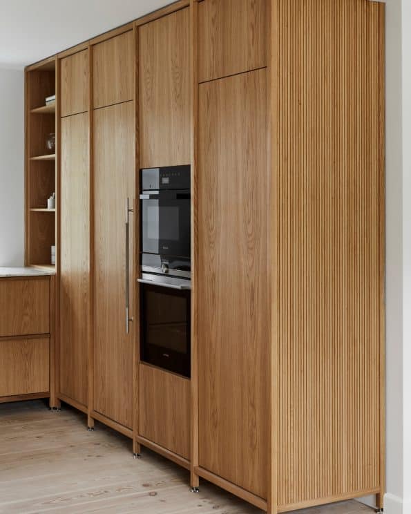 12 Design Tricks To Make A Small Kitchen Look & Feel Bigger